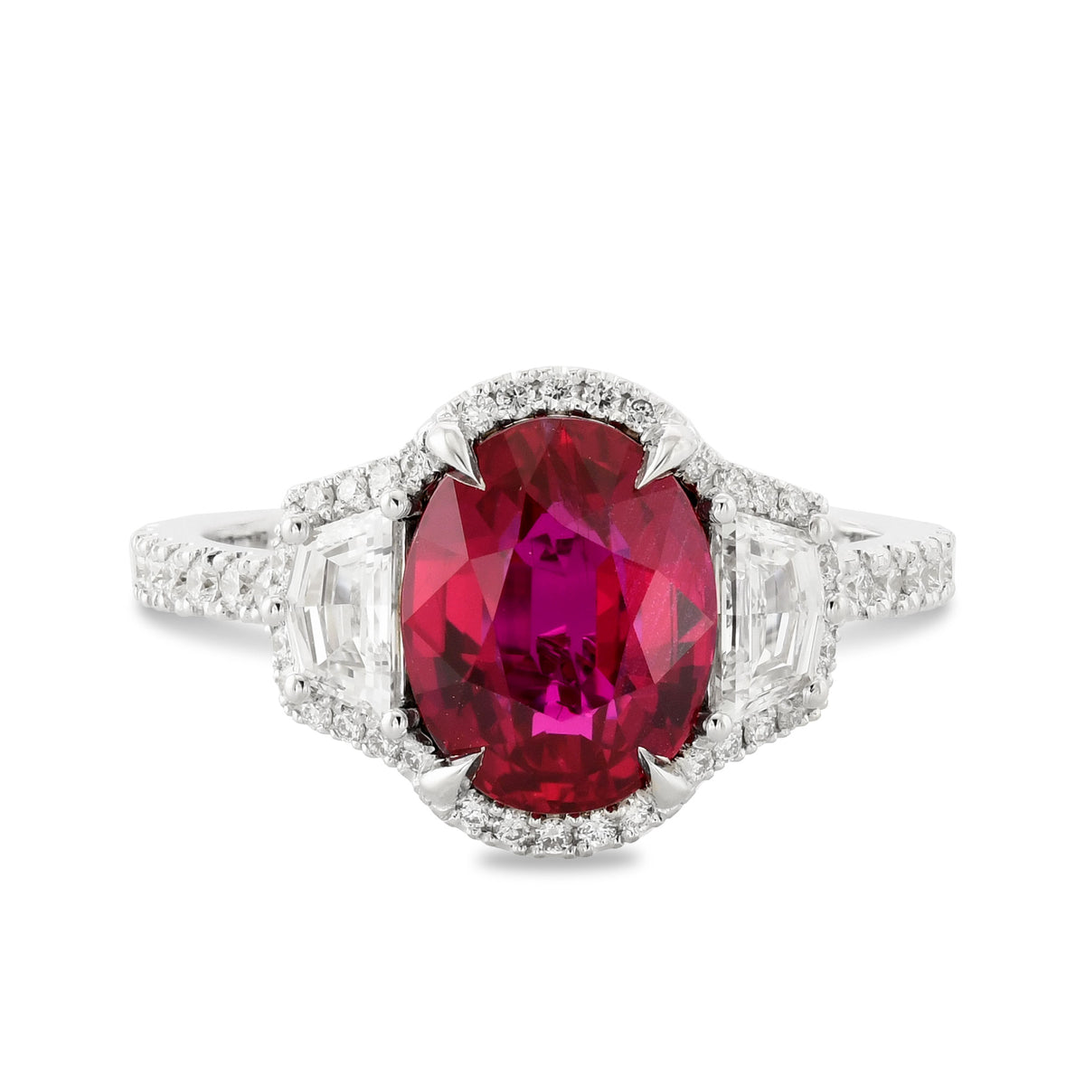 Oval Ruby Three-stone Halo Ring | LEIBISH